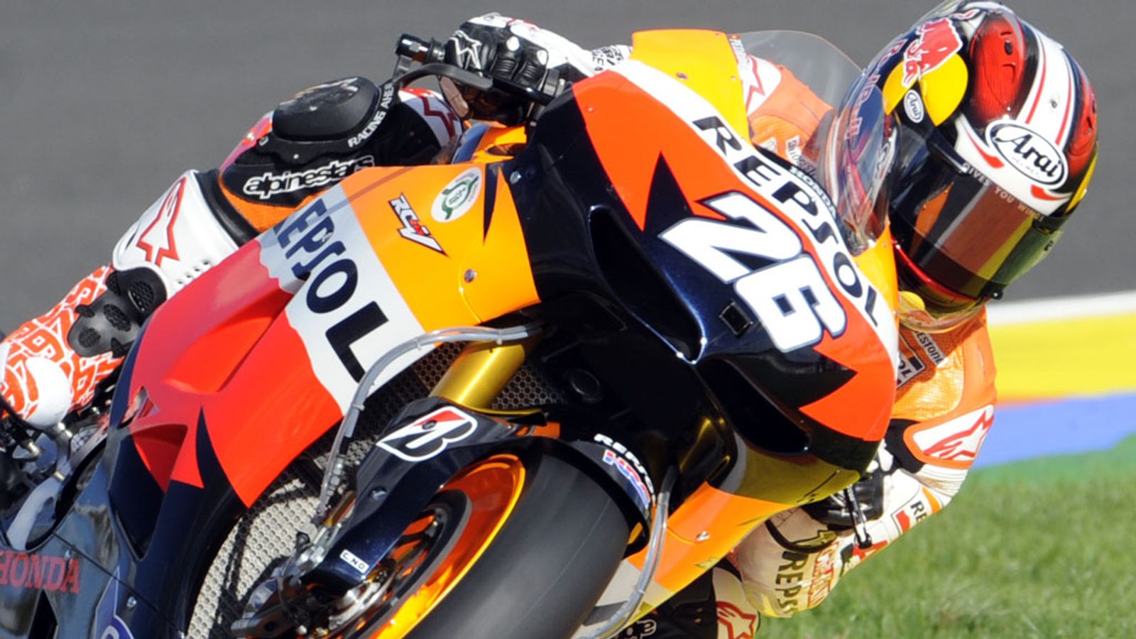 Dani Pedrosa grabbed pole for Sunday's Valencia MotoGP with a new lap ...