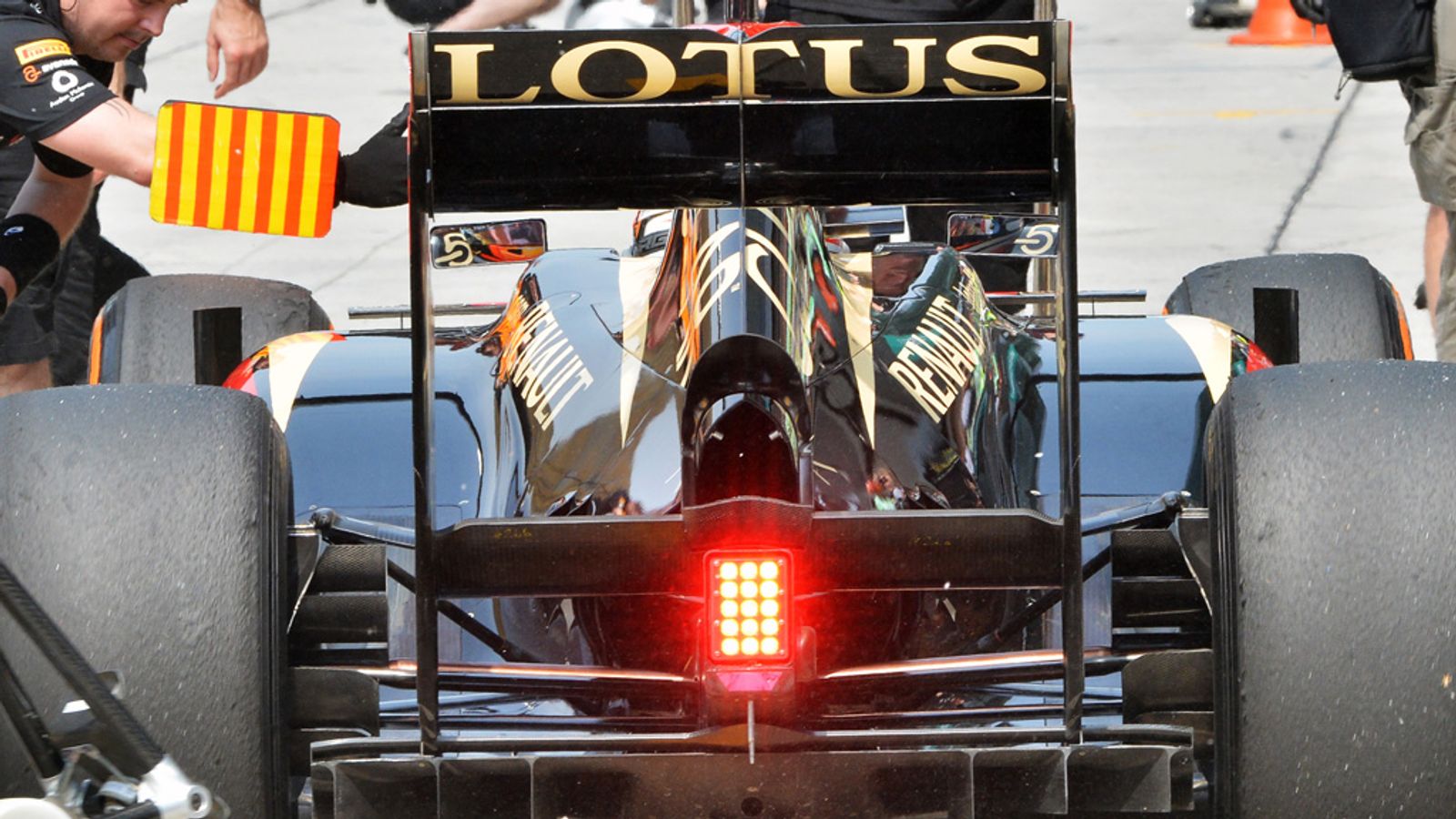 Flying Finn Kimi Raikkonen leads the charge as Lotus catch up with Red ...