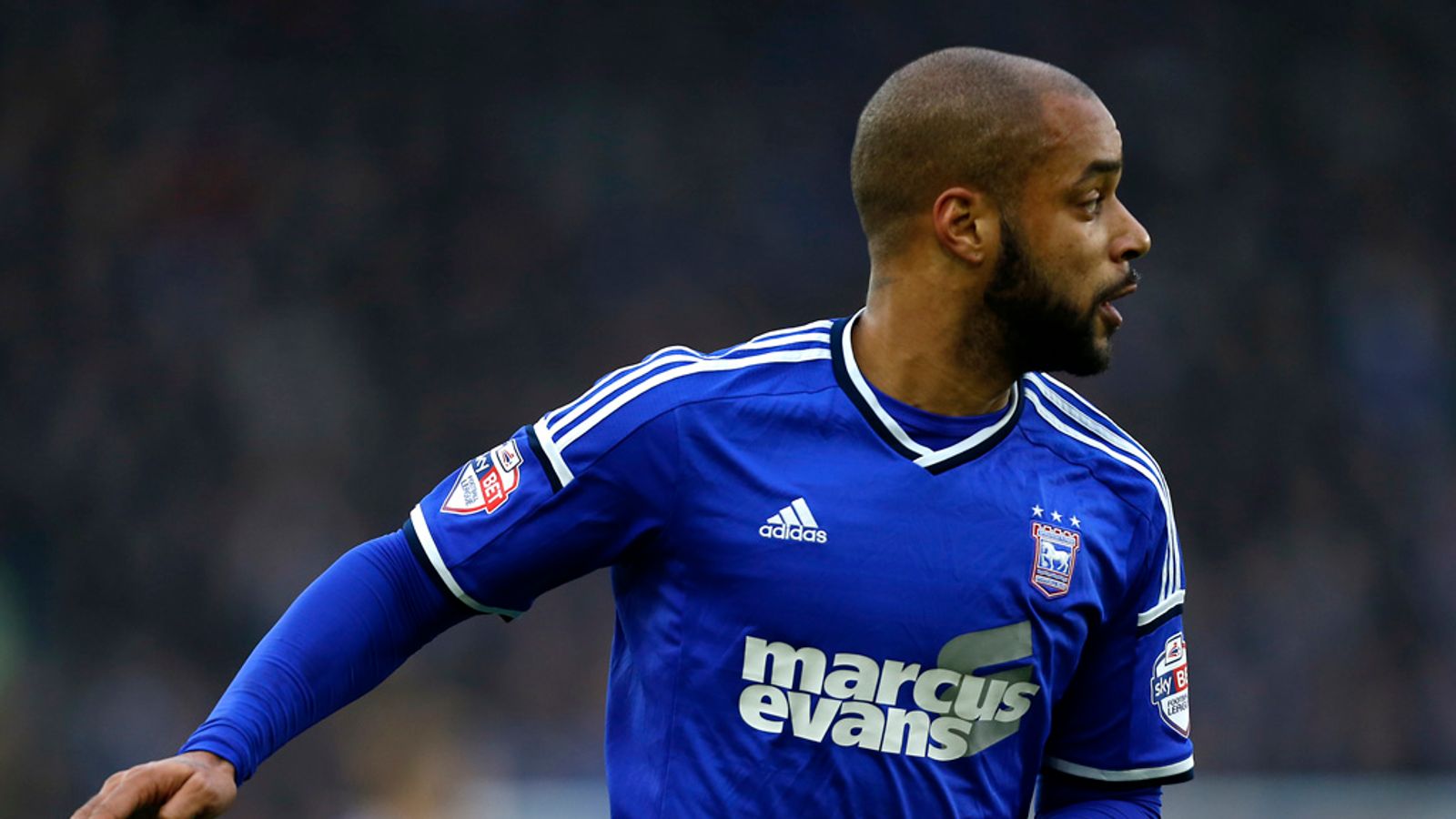 Ipswich forward David McGoldrick has signed a new contract extension ...