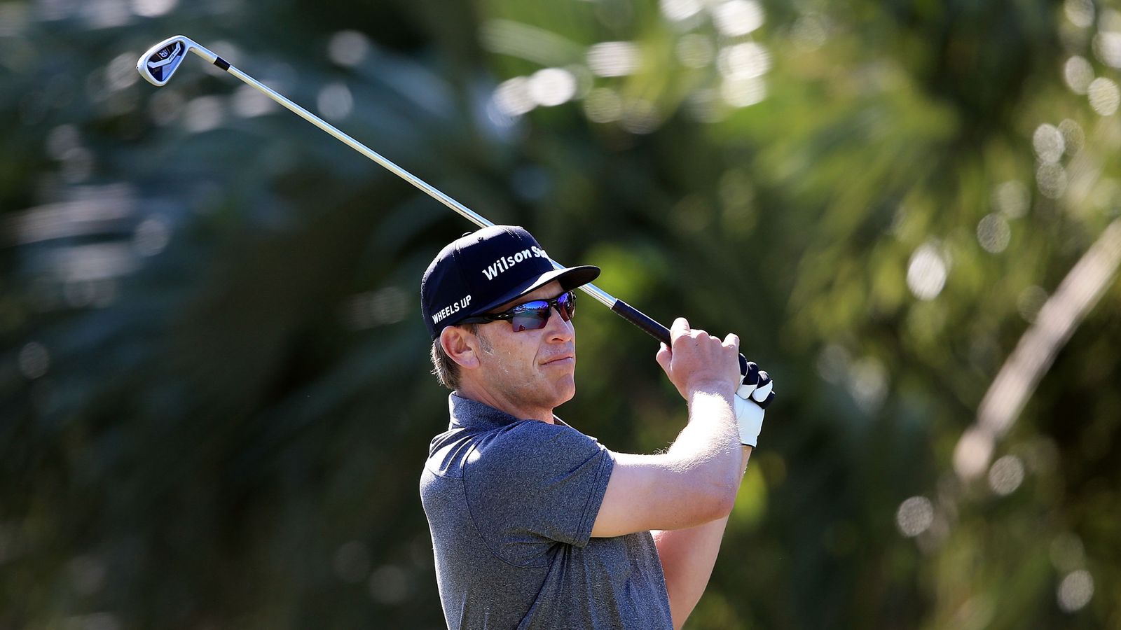 Ricky Barnes sends his shot backwards in to water at PGA National ...