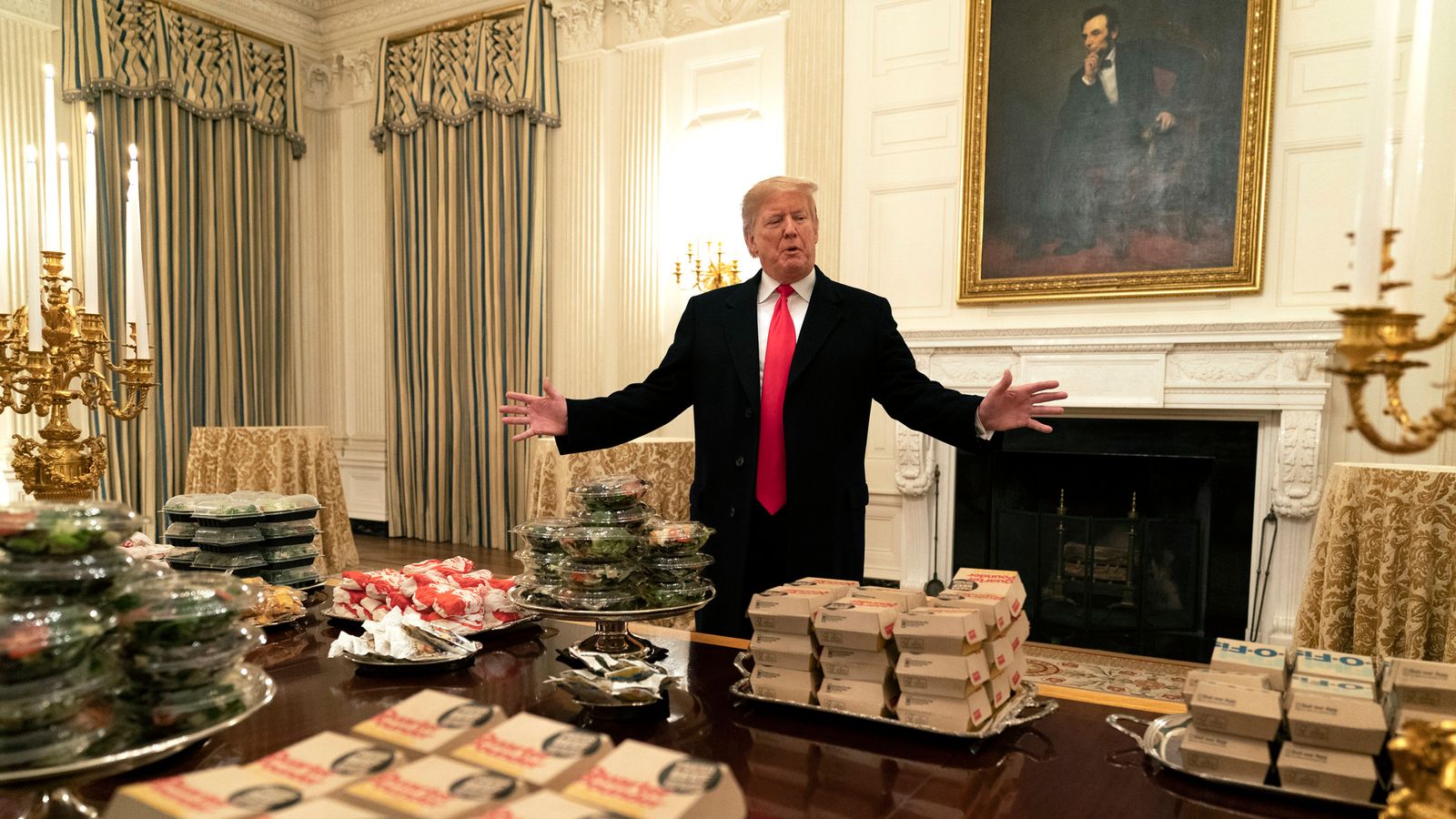 Donald Trump pays for burgers, fries and pizza for college football ...