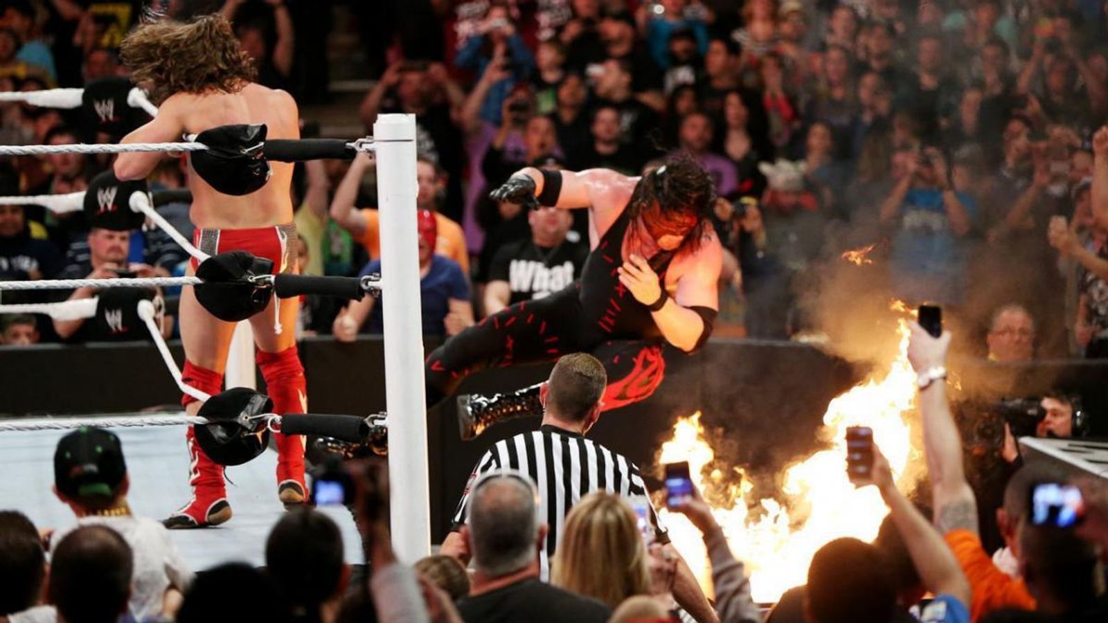 WATCH: Kane goes through flaming table at Extreme Rules 2014! | WWE ...
